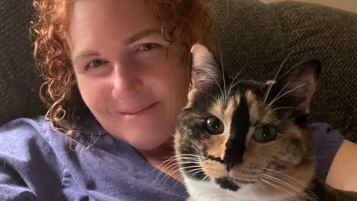 Rescue Cat Can't Stop Smiling After Finding Forever Home